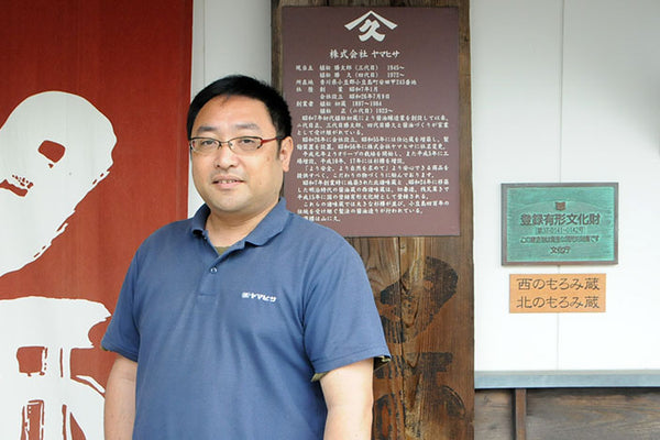 Three bottles with the organic JAS mark