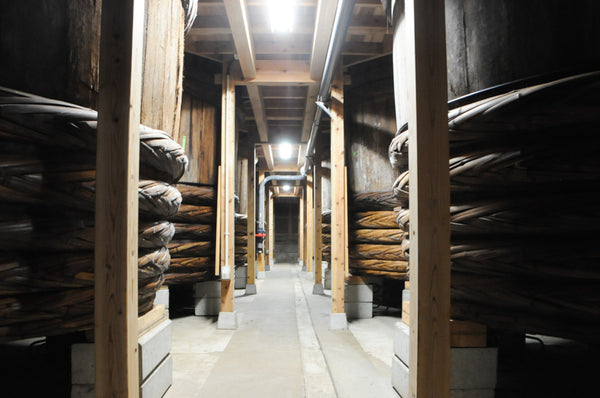 Three bottles with the organic JAS mark